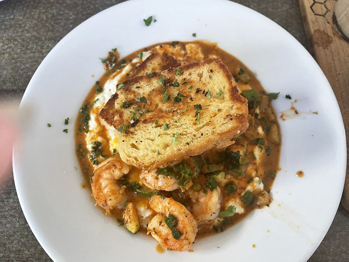 Shrimp and grits that make you understand why Southerners get misty-eyed when talking about this dish. Pure coastal comfort.