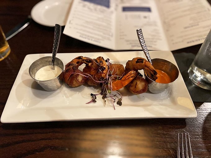 Plump shrimp dressed for a night out, perfectly cooked and ready to dive into twin pools of tangy and creamy sauces.