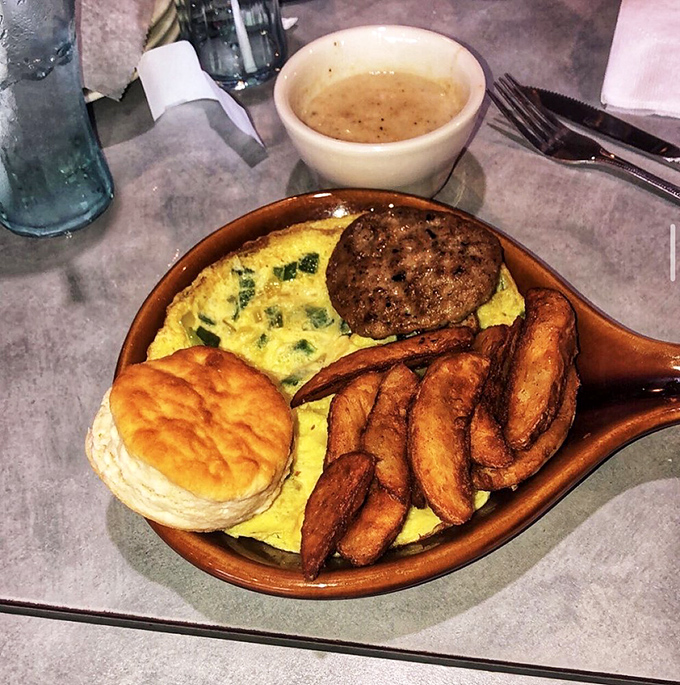Breakfast served in a skillet isn't just a meal&mdash;it's a statement that your day deserves to start with eggs, sausage, and buttery biscuit perfection.