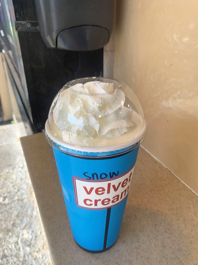The Snow Cream stands tall and proud&mdash;a blue cup of nostalgia topped with whipped cream that dares you to drink it slowly.