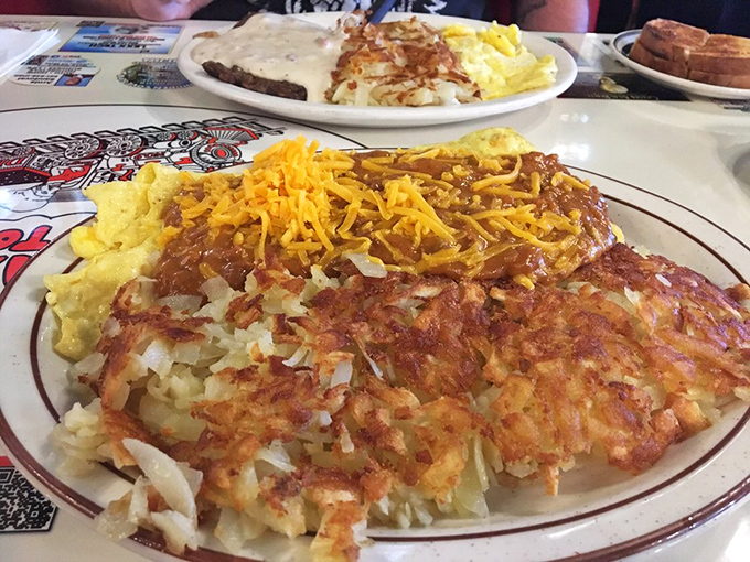 The Spanish Omelet with hash browns that have achieved the perfect crisp-to-tender ratio. This is the gold standard of breakfast potato engineering.