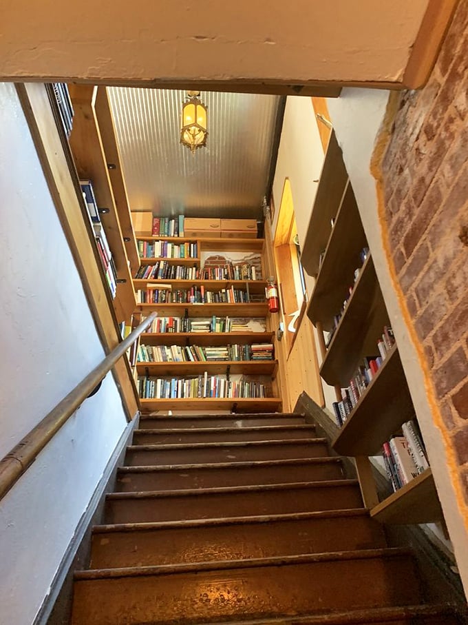 These well-worn stairs have carried thousands of book lovers between floors, each step a transition between literary worlds.