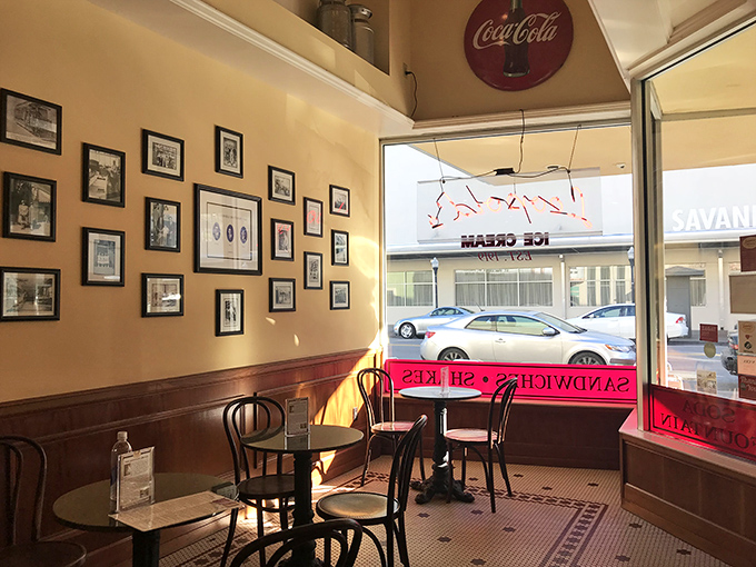 Where vintage meets comfort—those classic bentwood chairs have supported generations of ice cream enthusiasts, movie posters watching over everyone's indulgences.