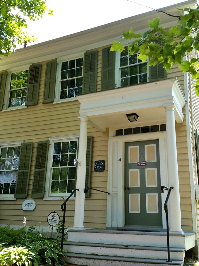 The Cranbury Museum's yellow facade and green shutters invite history buffs to step back in time without the inconvenience of actual time travel.
