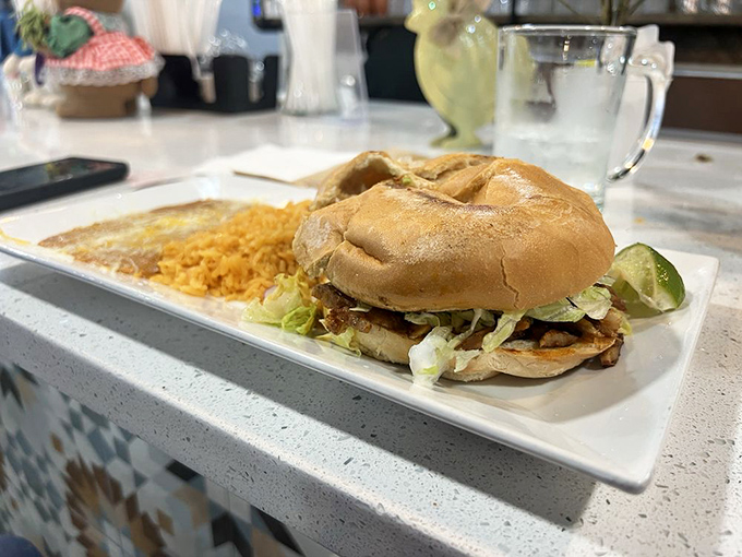 The torta's crispy-edged bread beckons like a siren song. That side of rice with its perfect fluffiness deserves its own fan club.