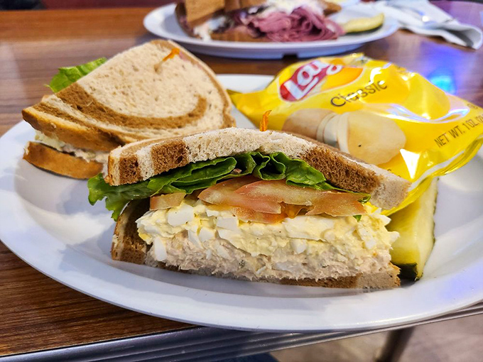 The sandwich that launched a thousand lunch breaks. Classic tuna and egg salad on rye&mdash;proof that sometimes the simple things are simply perfect.