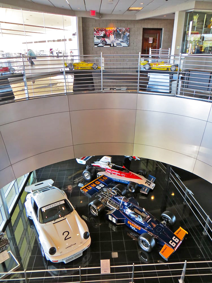 The museum's multi-level design offers different perspectives on racing history, like watching the sport from both the grandstand and pit lane simultaneously.