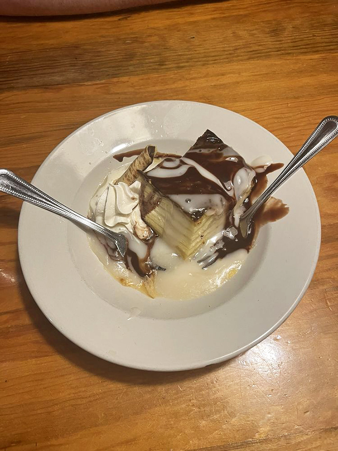 This vanilla cream strudel isn't just dessert&mdash;it's therapy on a plate. Flaky pastry, velvety cream, and chocolate drizzle creating the holy trinity of sweet satisfaction.