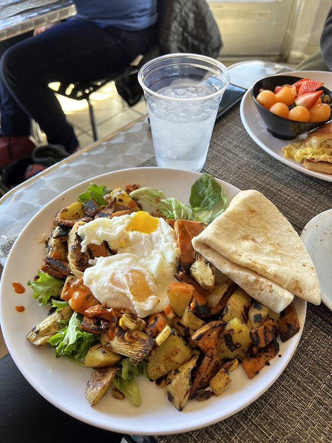 A vegetable hash that could convert the most dedicated carnivore. Those perfectly poached eggs are just waiting to create their own sauce.