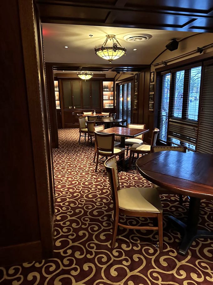 The private dining area whispers of special occasions and intimate gatherings. Elegant lighting transforms ordinary meals into memorable events.