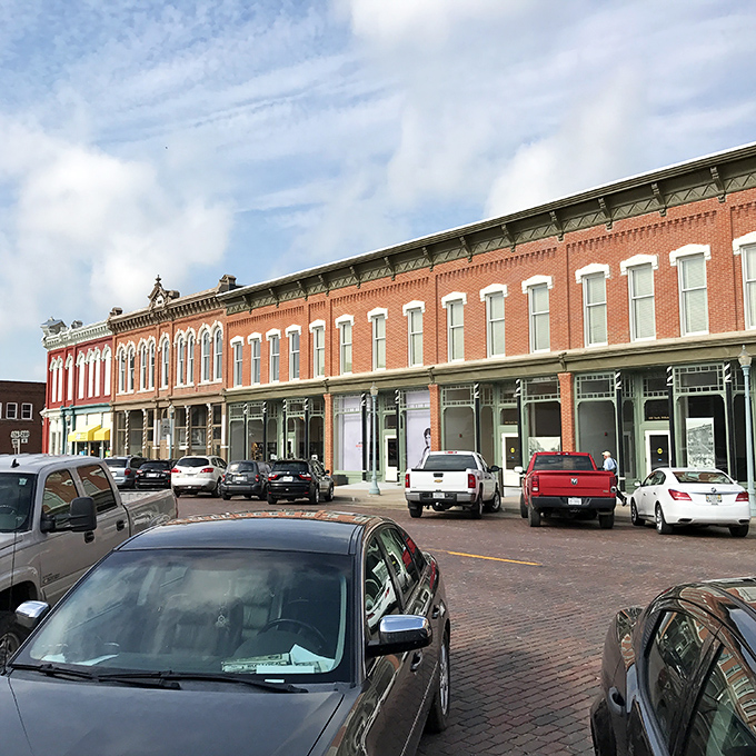 A streetscape straight from 1890. These historic storefronts along Webster Street have stories embedded in every brick and cornice.