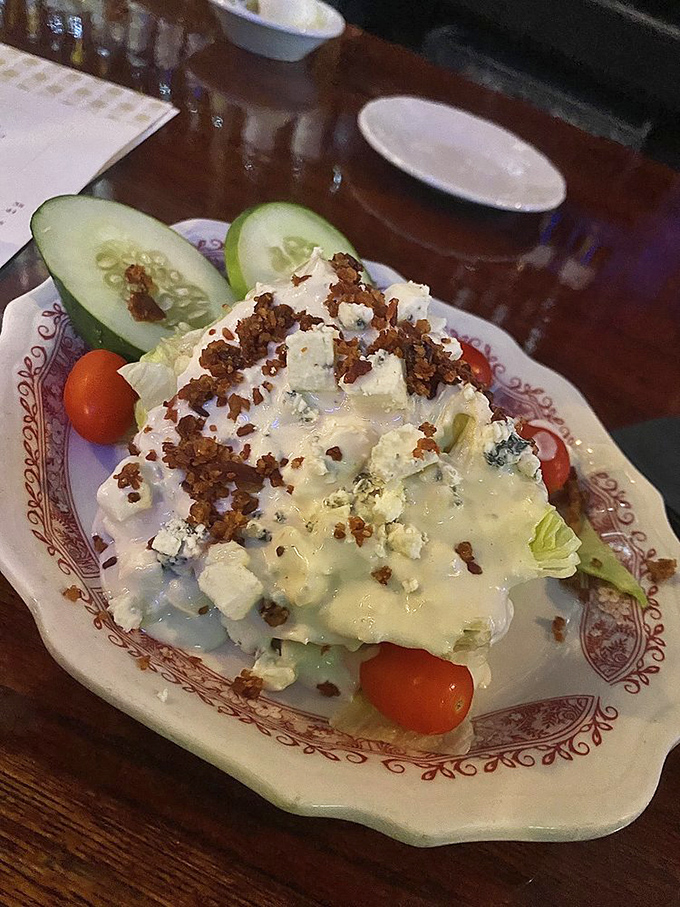 A wedge salad that makes eating vegetables feel like cheating on your diet. Those bacon bits are the jewelry this lettuce deserves.