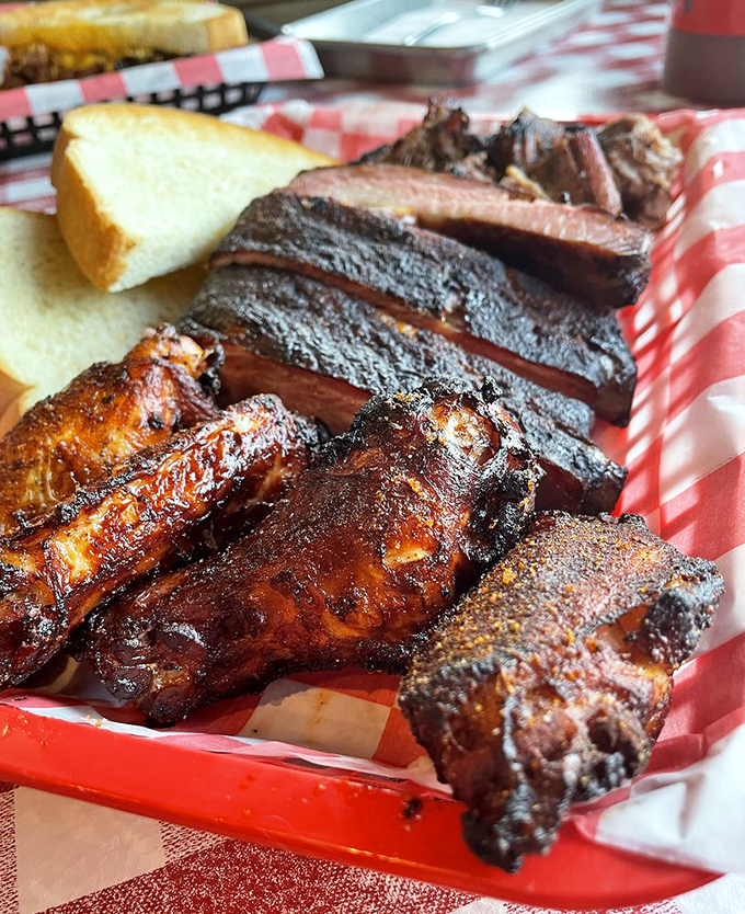 Wings and ribs: the dynamic duo of the barbecue world. This basket contains enough protein to fuel a marathon, or more realistically, an epic post-meal nap.