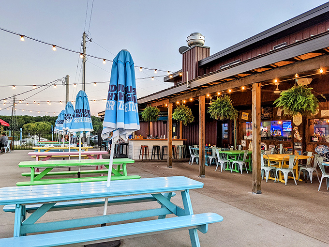 Colorful picnic tables at the Yardarm scream "summer happiness" louder than your grandkids at the pool. Riverside dining where the atmosphere is as refreshing as the beverages.