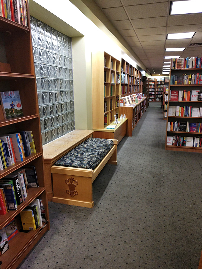 The quiet corridors between worlds, where bench seating invites you to sample a chapter before committing to the full journey.