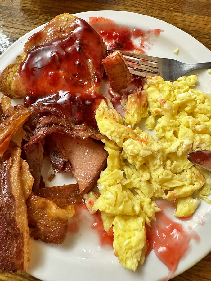 Strawberry-topped French toast, crispy bacon, and eggs&mdash;the breakfast holy trinity that makes getting out of bed worthwhile.