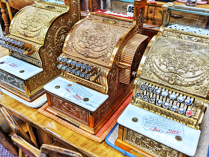 These ornate brass cash registers weren't just tools for commerce; they were mechanical masterpieces, each key press a satisfying click of retail history.