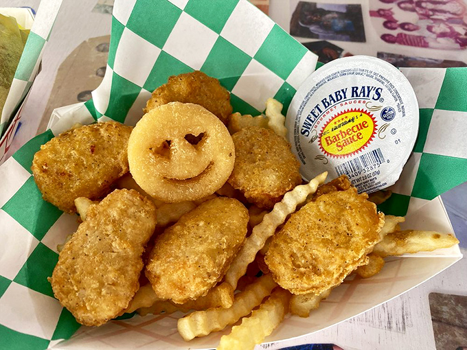 Chicken nuggets with another friendly potato face&mdash;because at Snow Cap, even your food is determined to make you smile.