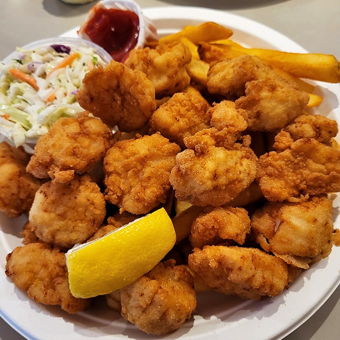 Fried scallops so sweet and tender, they're practically dessert – golden nuggets of oceanic perfection that disappear far too quickly.