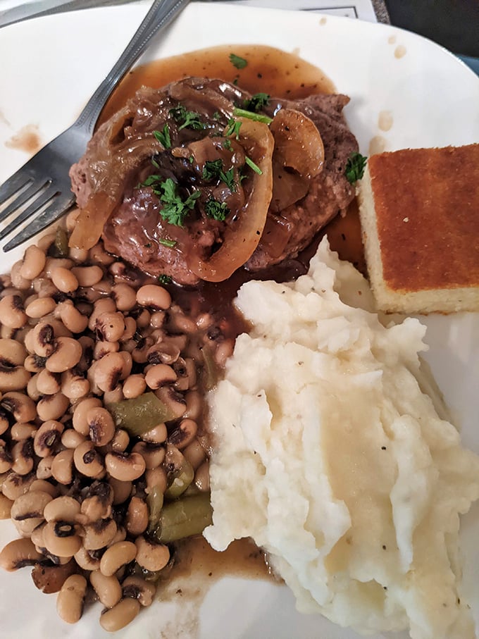 Southern comfort on a plate&mdash;chopped steak, black-eyed peas, and mashed potatoes. This isn't a meal; it's a warm hug from Georgia.