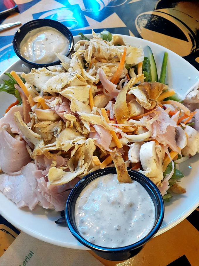 A salad so abundant it makes you wonder if they're charging by the ounce or just showing off their generosity.