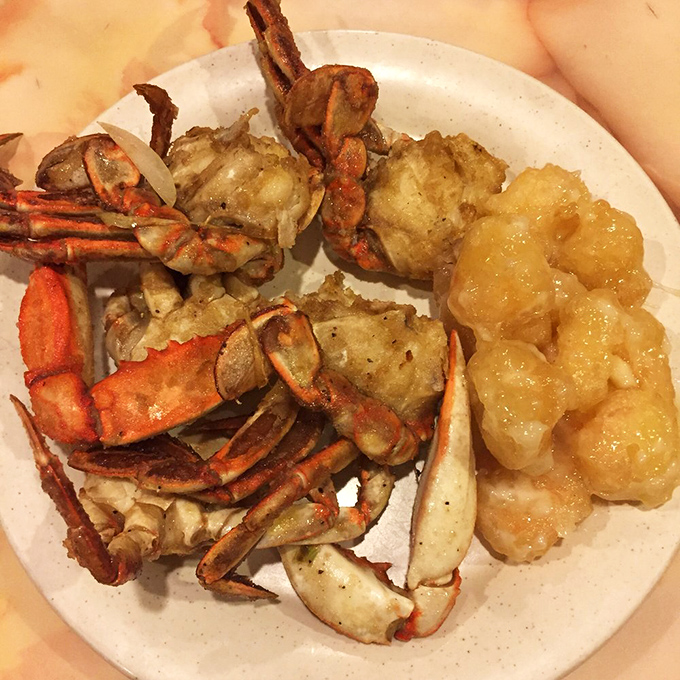 These scallops in their shells look like they're attending their own fancy gala, dressed in glass noodles and ready for their close-up. 