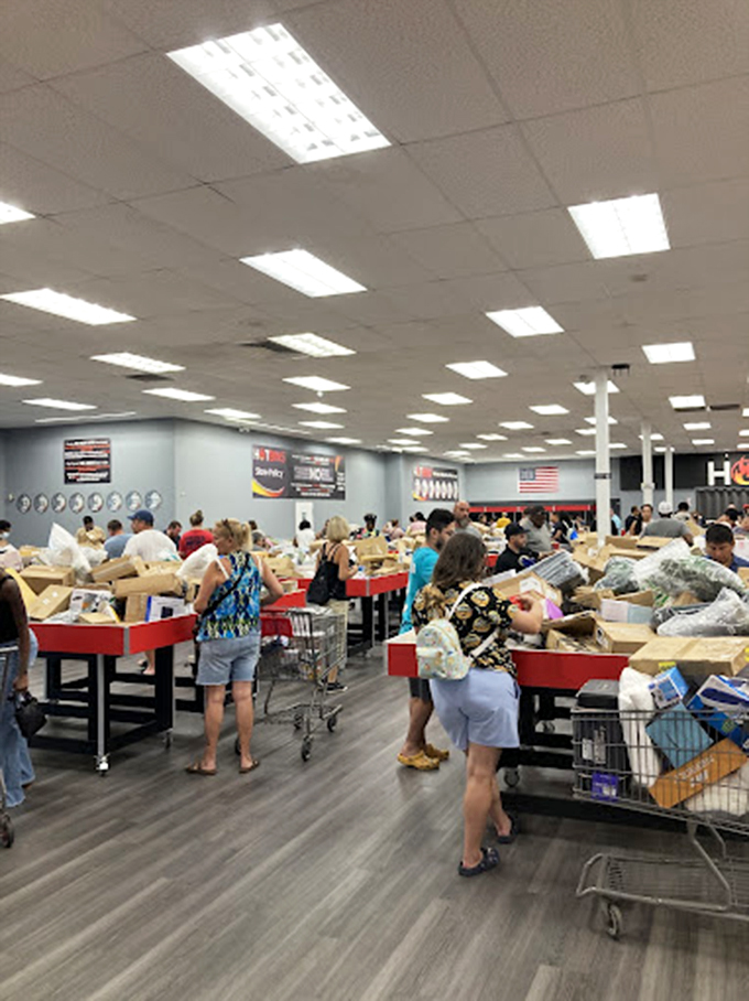 The serious faces of dedicated bargain hunters. Like archaeologists on a dig, they know that patience and persistence yield the greatest rewards.