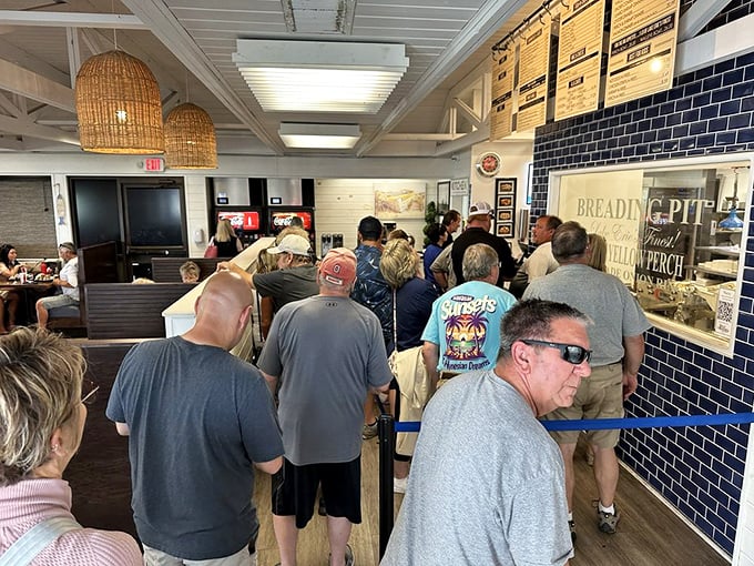 The line of hungry pilgrims says it all. Like waiting for concert tickets in the '70s, but the reward is fried perfection instead of rock and roll.
