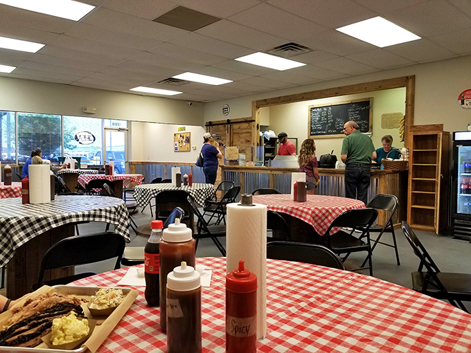 Where barbecue pilgrims gather to worship at the altar of smoke. Simple surroundings let the food remain the undisputed star.