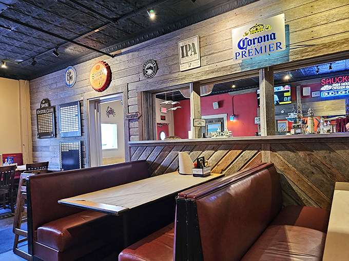 Rustic wood paneling and comfortable booths create that "I've discovered something special" feeling. Beer signs add that perfect touch of unpretentious charm.