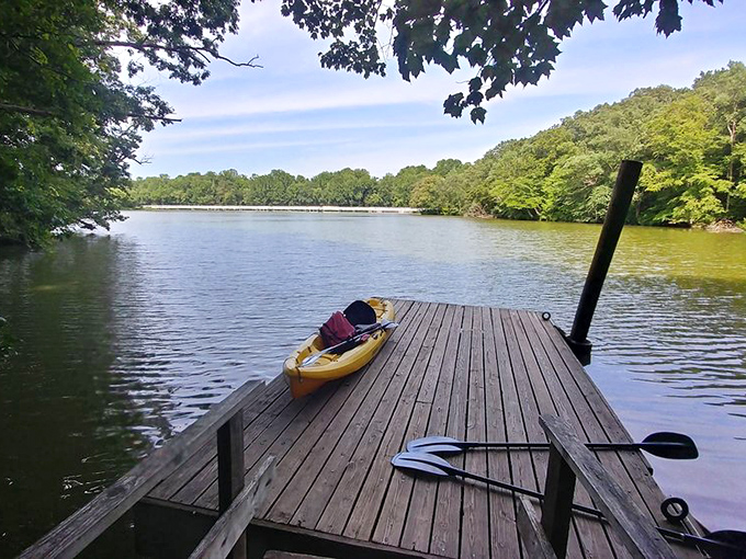 A wooden dock stretching into possibility&mdash;just add kayak and subtract your everyday worries.