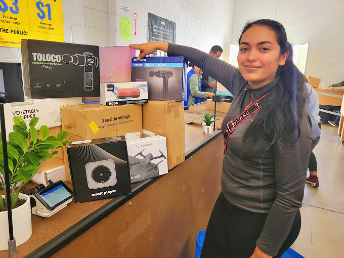 "Look what I discovered!" The universal expression of bin store triumph. That massage gun might be the best $5 investment in self-care history.