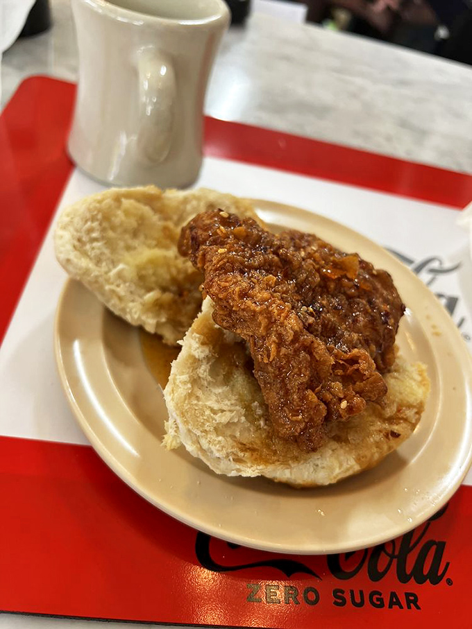 A fried chicken biscuit that renders conversation impossible. Just nods of appreciation and the occasional "mmph" of pure satisfaction.