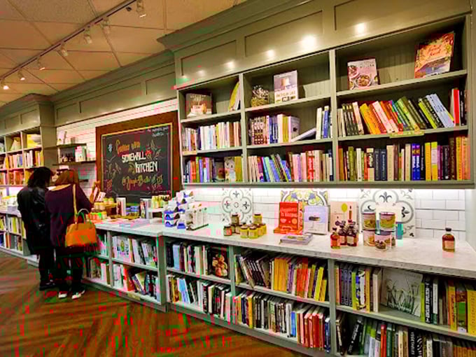 Rows of gourmet cookbooks and specialty kitchen goods invite you to browse, offering delicious inspiration for your next culinary adventure.