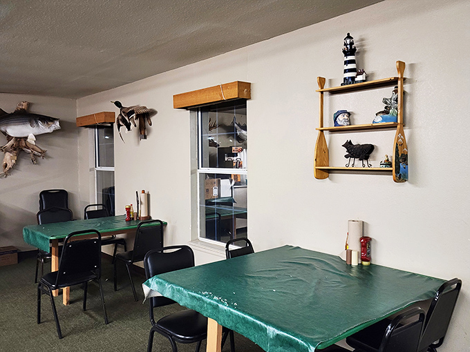 Nautical touches and fishing memorabilia transform this simple dining room into a shrine dedicated to Lake Texoma's aquatic bounty.