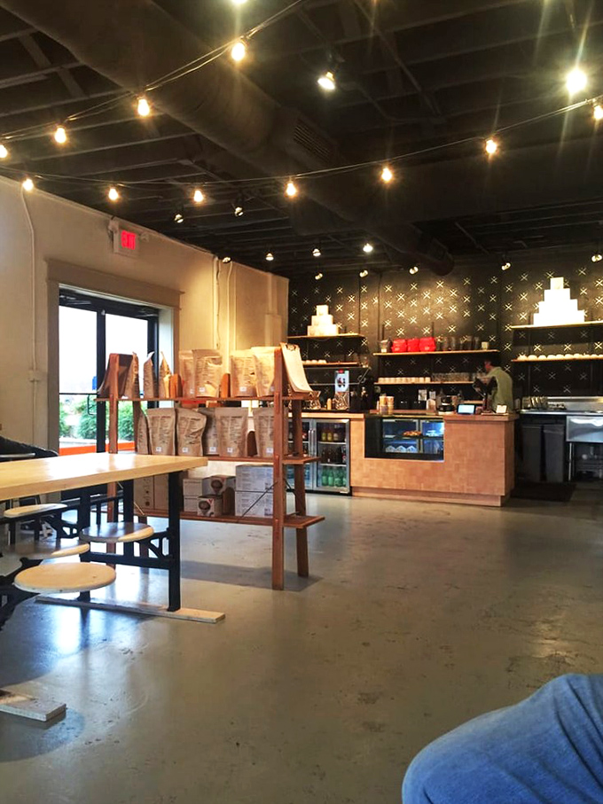 Industrial chic meets Memphis warmth&mdash;exposed ducts and concrete floors softened by wooden tables where coffee dreams and creative conversations unfold daily.