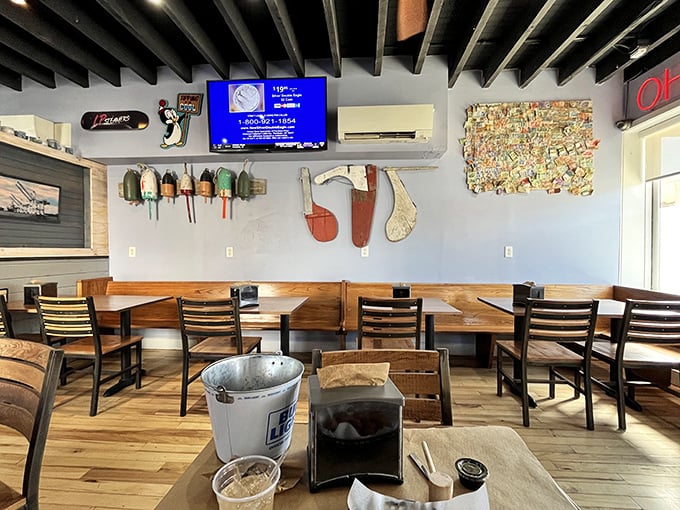 Exposed beams, wooden tables, and maritime decor&mdash;the dining room feels like the cozy galley of a ship that's found treasure.