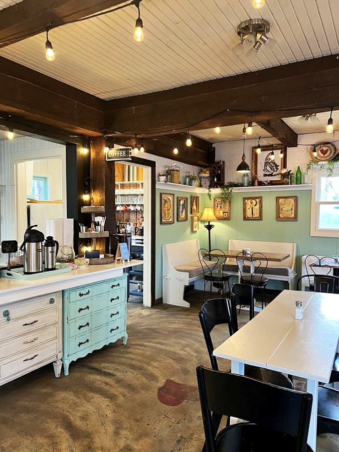 Mint walls, exposed beams, and whimsical d&eacute;cor create an atmosphere that feels like dining in your most stylish friend's country cottage.