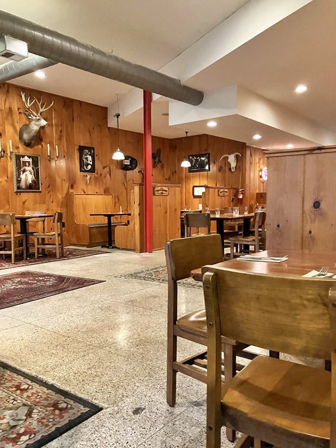 Taxidermy on pine-paneled walls&mdash;the universal sign that you're about to eat something that would make your cardiologist wince but your soul sing.