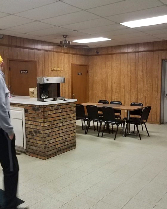 No-frills dining area with practical charm—because when the donuts are this good, fancy furniture would just be a distraction.