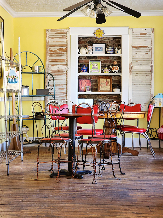 Vintage charm meets sugar-fueled happiness. The cozy seating area with its brick-backed shelves feels like your favorite aunt's kitchen—if she were a pastry genius.