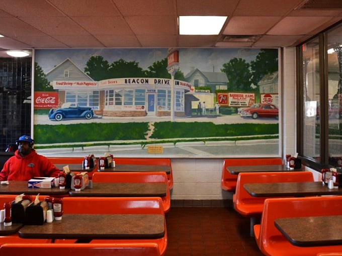 The mural depicting The Beacon's early days isn't just decoration—it's a time machine to when drive-ins were America's living rooms on wheels.