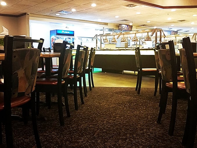 The path to buffet glory, lined with empty tables soon to be filled with diners planning their strategic approach to multiple courses.