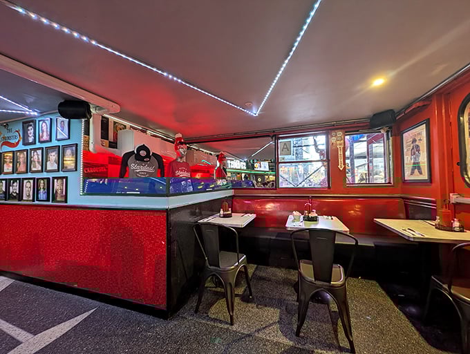 The diner's retro-meets-theatrical design creates the perfect backdrop for both your meal and the impromptu performances that might erupt at any moment.