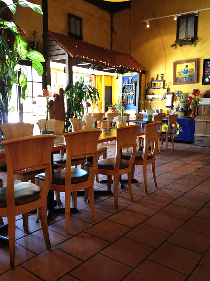 Plants, natural light, and cheerful yellow walls create the perfect backdrop for the main event&mdash;food that makes you want to hug the chef.
