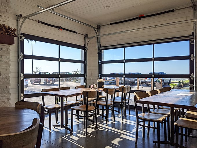 Garage door windows flood the dining room with natural light, making this the sunniest spot to enjoy treasures from the deep. Lake views included, no extra charge.