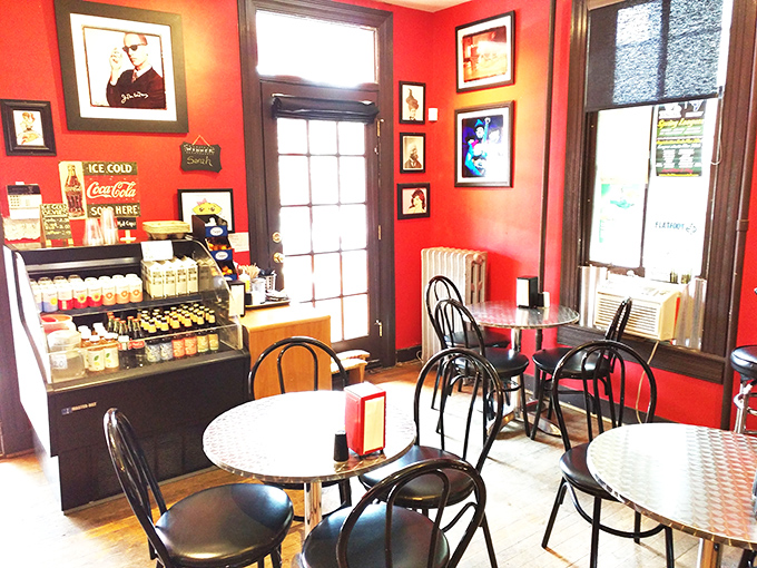 The vibrant red interior feels like stepping into a rockabilly album cover. Metal tables, bistro chairs, and pie-centric decor create an unpretentious vibe.