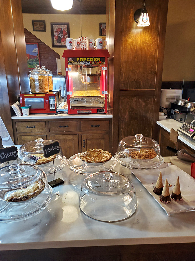 Display cases that promise treasure, wooden details that whisper history, and a space that invites you to linger longer than you planned.