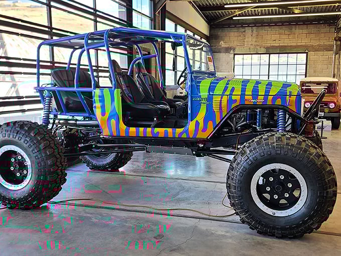 Psychedelic paint meets monster truck proportions in this modified FJ40, proving that Land Cruiser customization knows no bounds of imagination or gravity.