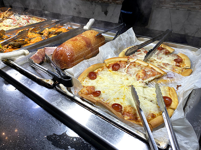 Even in seafood paradise, pizza maintains its rightful place. Because sometimes between crab legs, you just need a slice of familiar comfort.